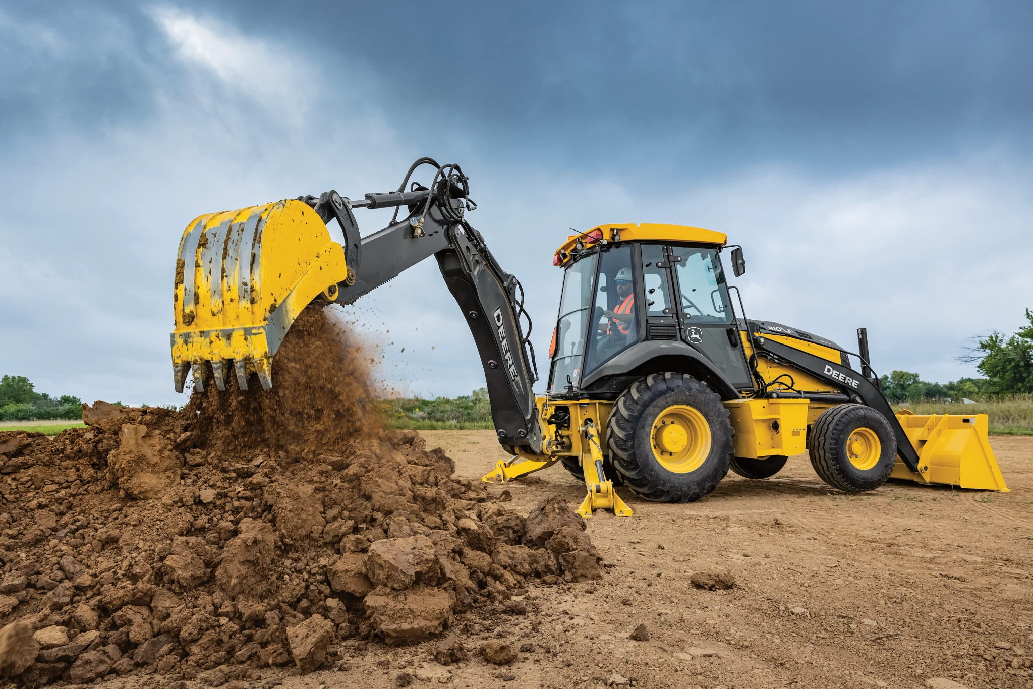 Pioneering Sustainability: The John Deere Electric Backhoe | 4Rivers ...